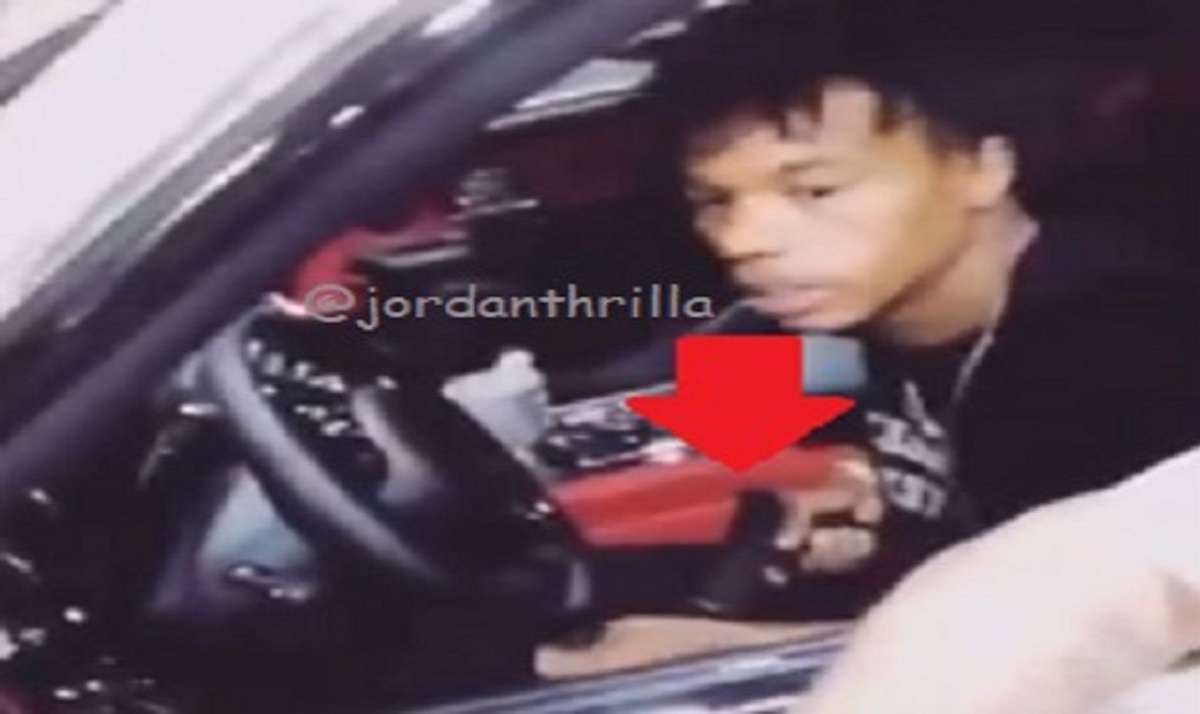 Lil Baby Clutches a Gun Ready To Shoot Fans by His Car in Viral Video
