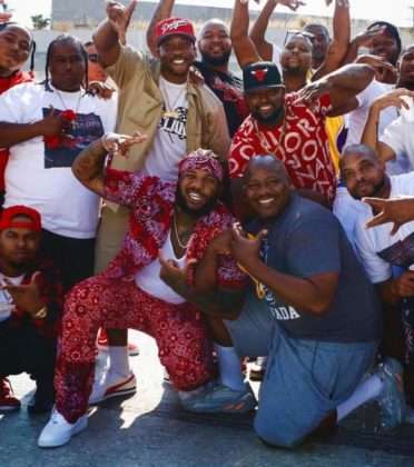 Why is Game Throwing Up Crip Gang Signs with Big U in New Viral Photo?